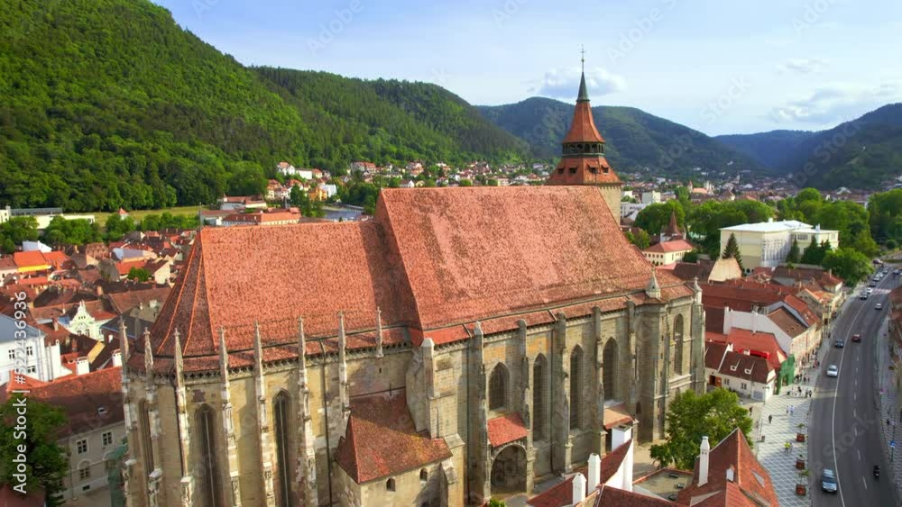 Aerial drone view of the The Black Church in old Brasov centre, Romania ...