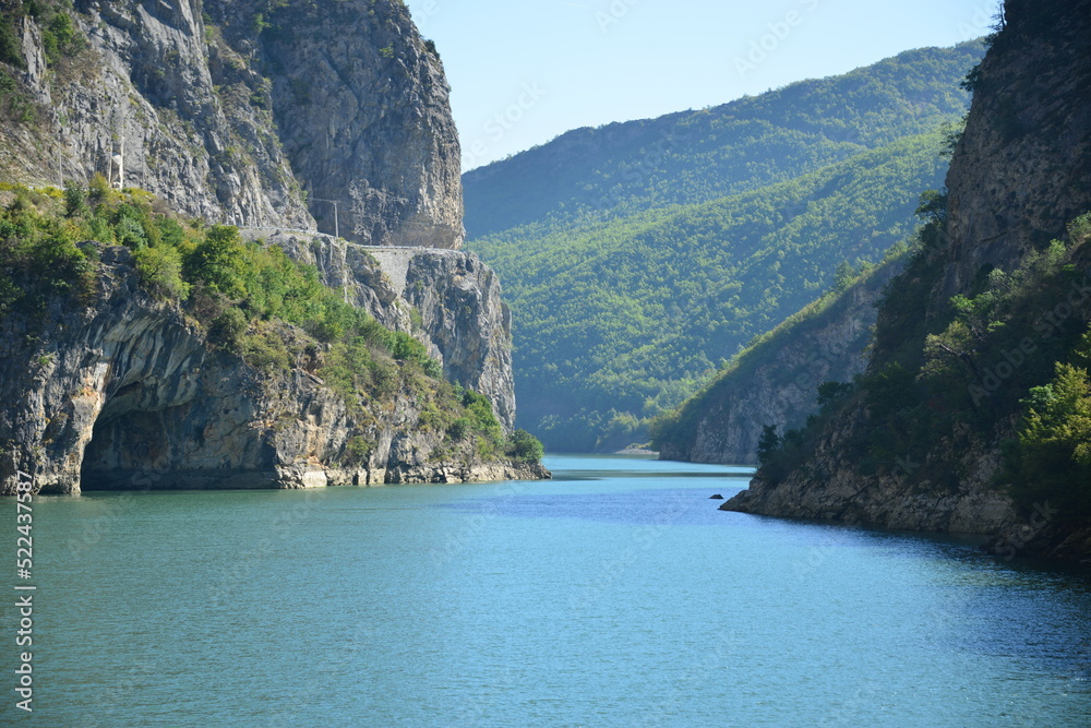 Albania, Lake Koman is a reservoir on the Drin River in northern ...