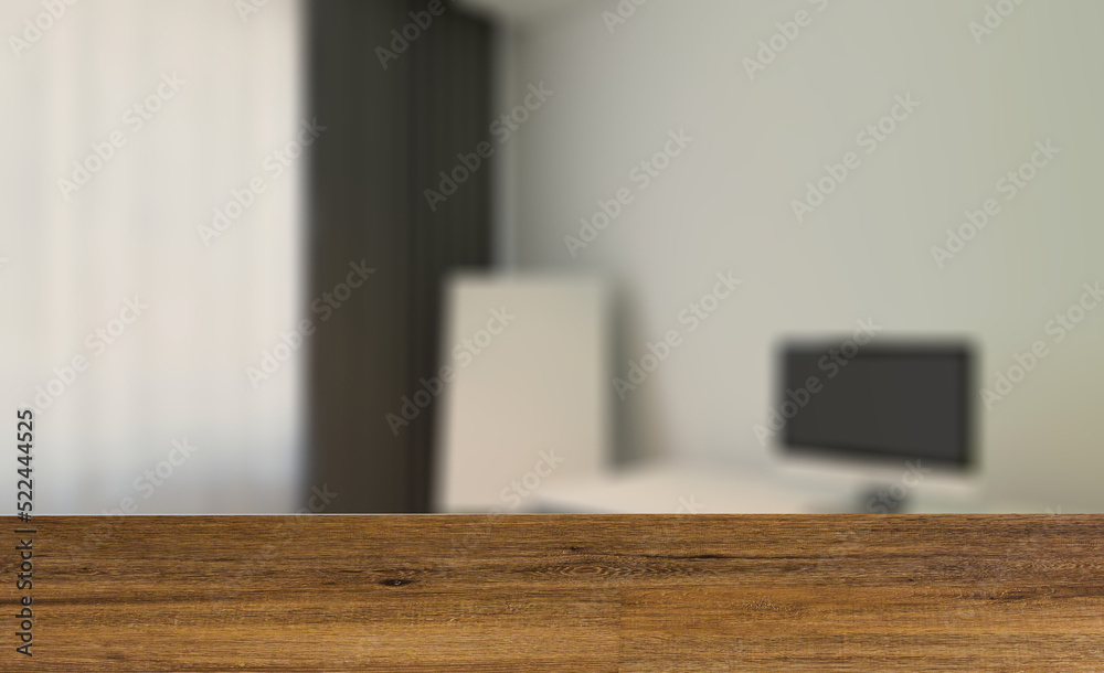 Front view of an office interior with a row of dark wood tables ...