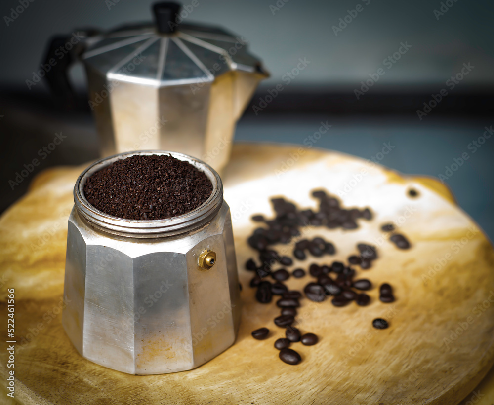 An image coffee ground in moka pot is a coffee maker is a beverage for ...