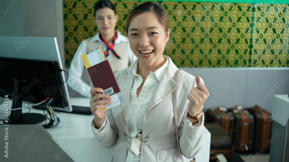 Portrait of beautiful Asian woman airport ground attendant in uniform ...