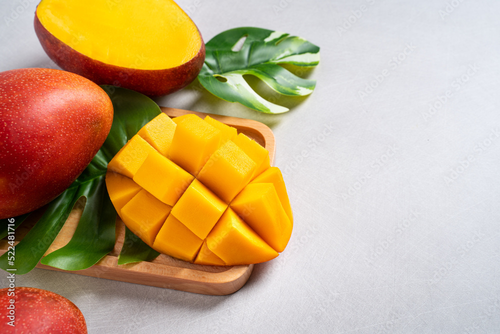 Mango background design concept. Top view Diced fresh mango fruit on ...