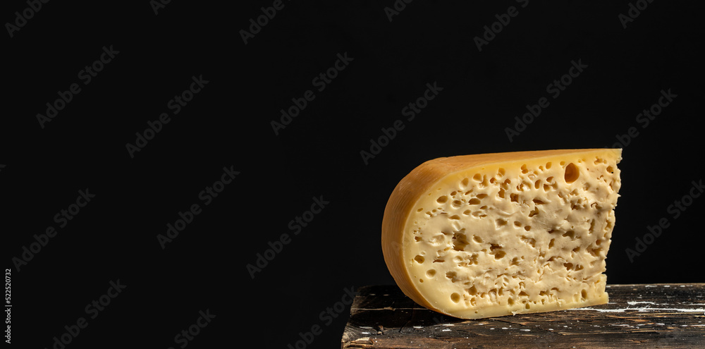 Emmental cheese triangle, Swiss cheese. piece of cheese maasdam with ...