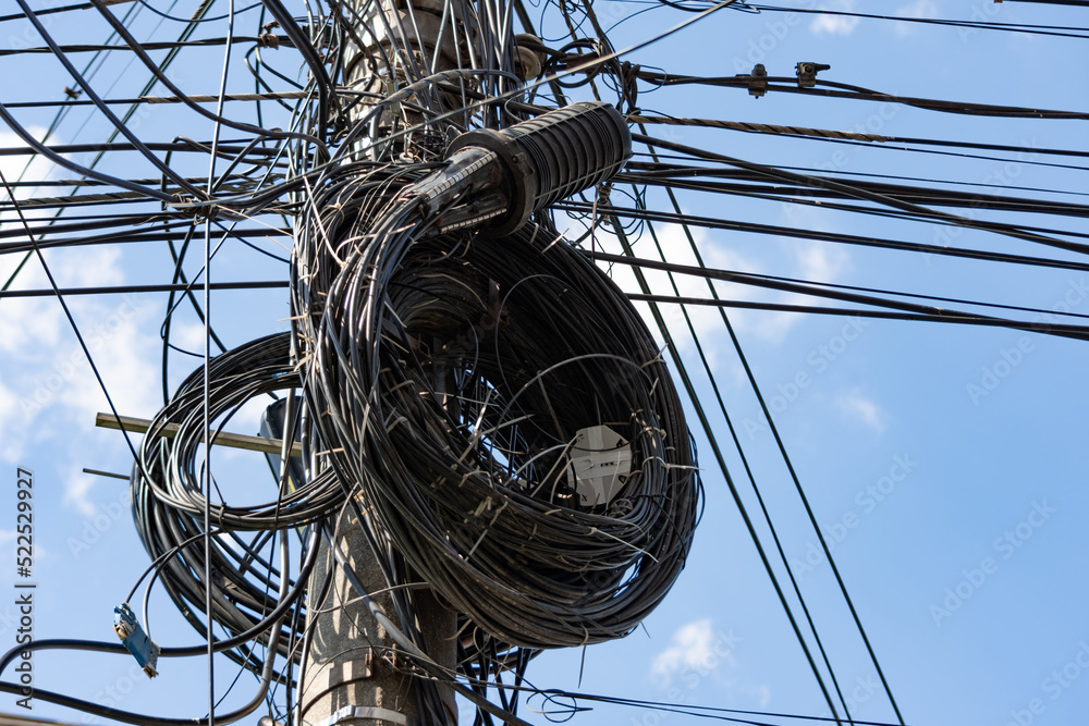 Tangle cables on a pillar connected in a splice for fiber optics Stock ...