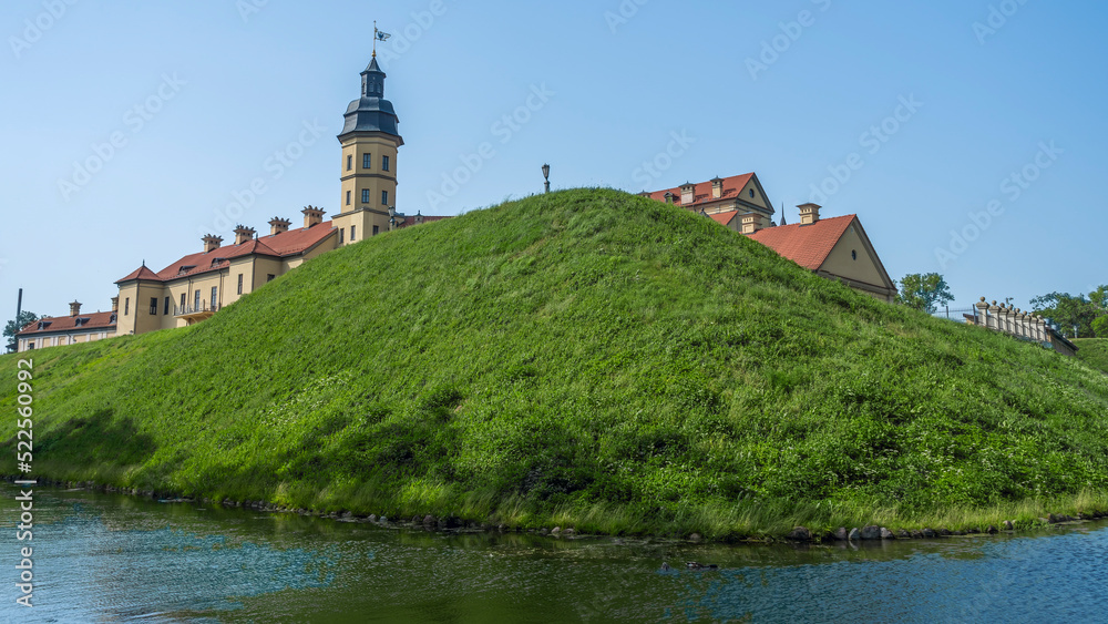 Moat of old castle. Moat with reflection in the water and trees. Sunny ...