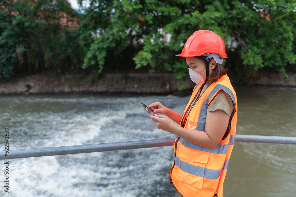 Asian Female engineering working . at sewage treatment plant,Marine ...