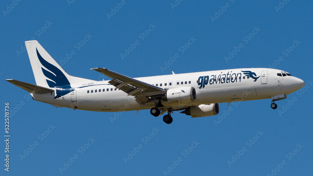 GP Aviation Boeing 737-400 | Plane in Final Approach against Blue Sky ...