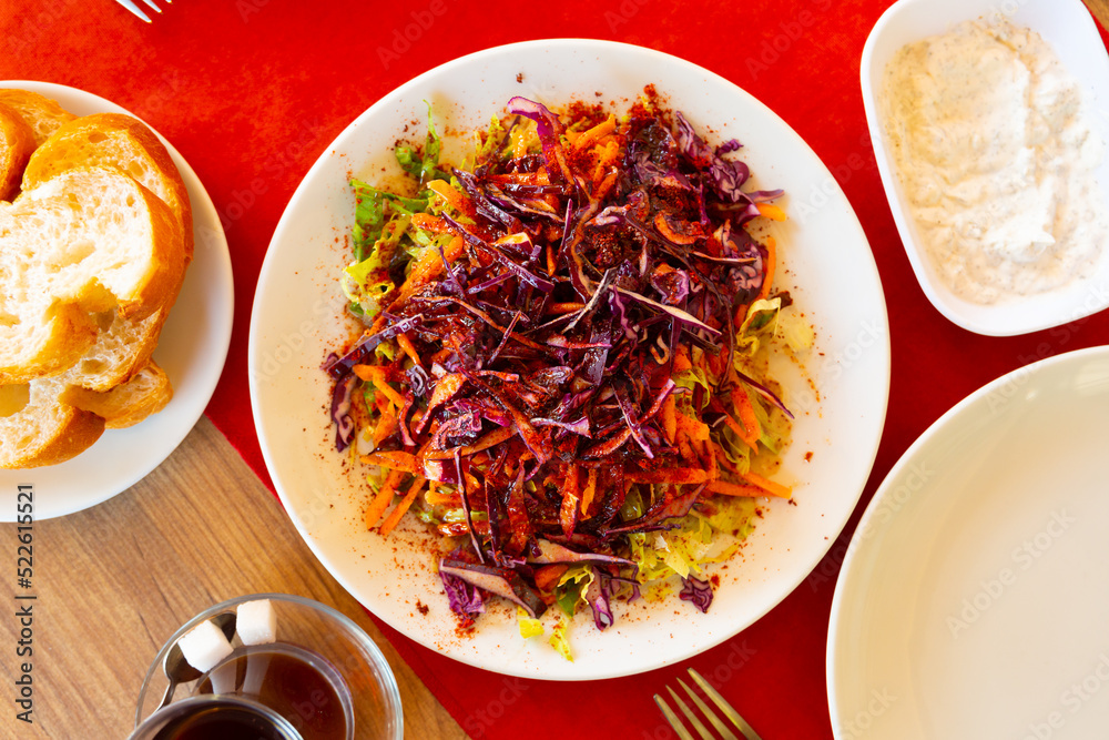 Traditional Turkish kebab salad of shredded white and red cabbage ...