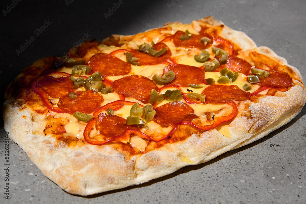 Traditional italian food - Pizza pepperoni on dark background ...