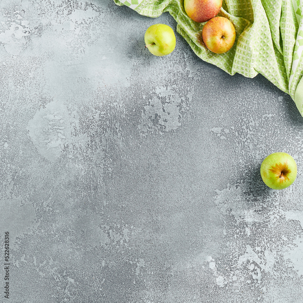 Food background with textile and apple. Pastry composition on concrete ...