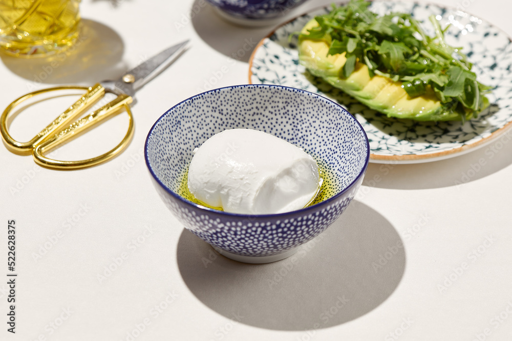 Aesthetic composition with mozzarella cheese in olive oil. Fresh ...