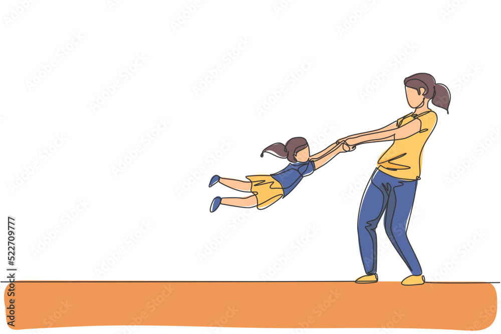 One single line drawing of young happy mom raising and turning her ...