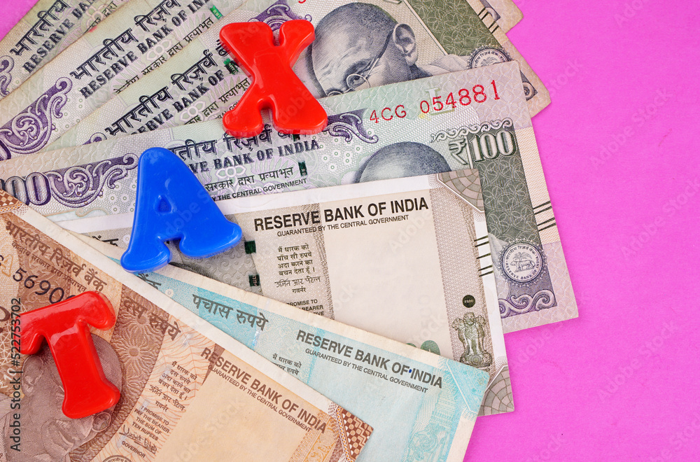 Time to pay TAX concept. TAX alphabet with Indian currency notes and ...