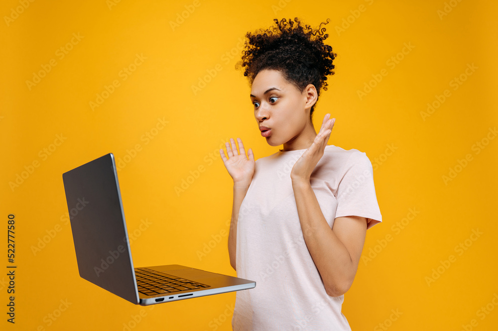Emotional Puzzled Shocked Curly Haired African American Young Woman