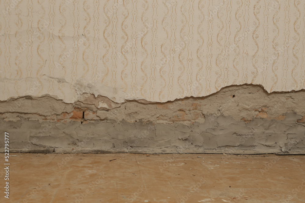 Moisture damage on the wall in the old house and the newly installed ...