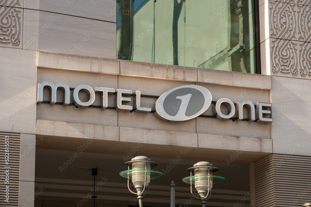 BERLIN, GERMANY - 24. July 2022: Motel One logo on a building wall. A ...