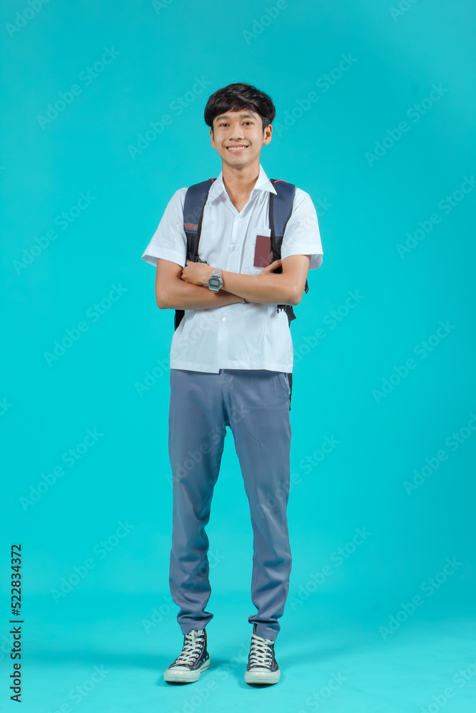 Indonesian male high school students wearing gray and white uniforms ...