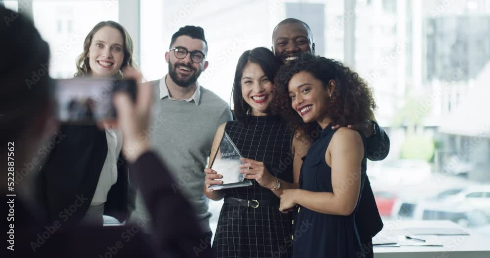 Business people taking photo at an awards ceremony, celebrating success ...