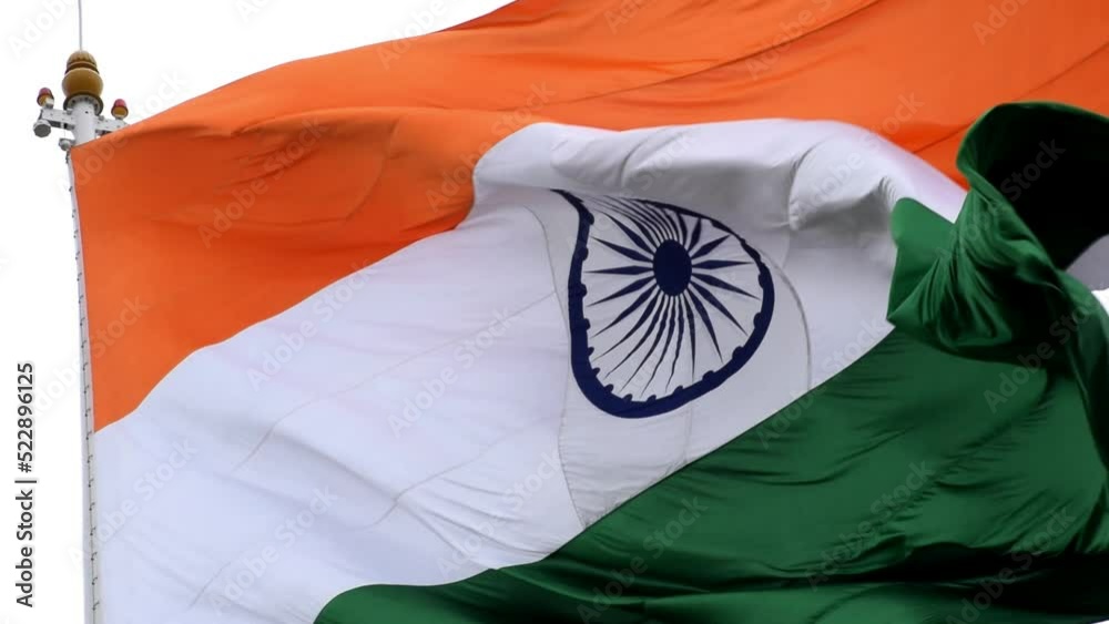 India flag flying high at Connaught Place with pride in blue sky, India ...