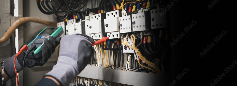 Electricity and electrical maintenance service, Engineer hand holding ...