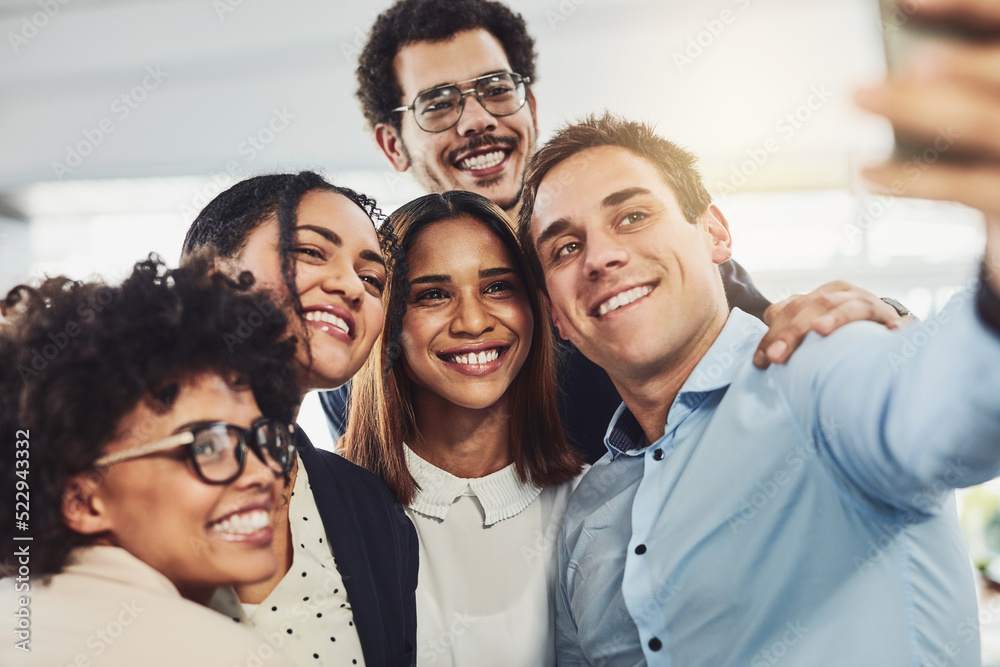 Happy, diverse and carefree colleagues taking a selfie to share on ...
