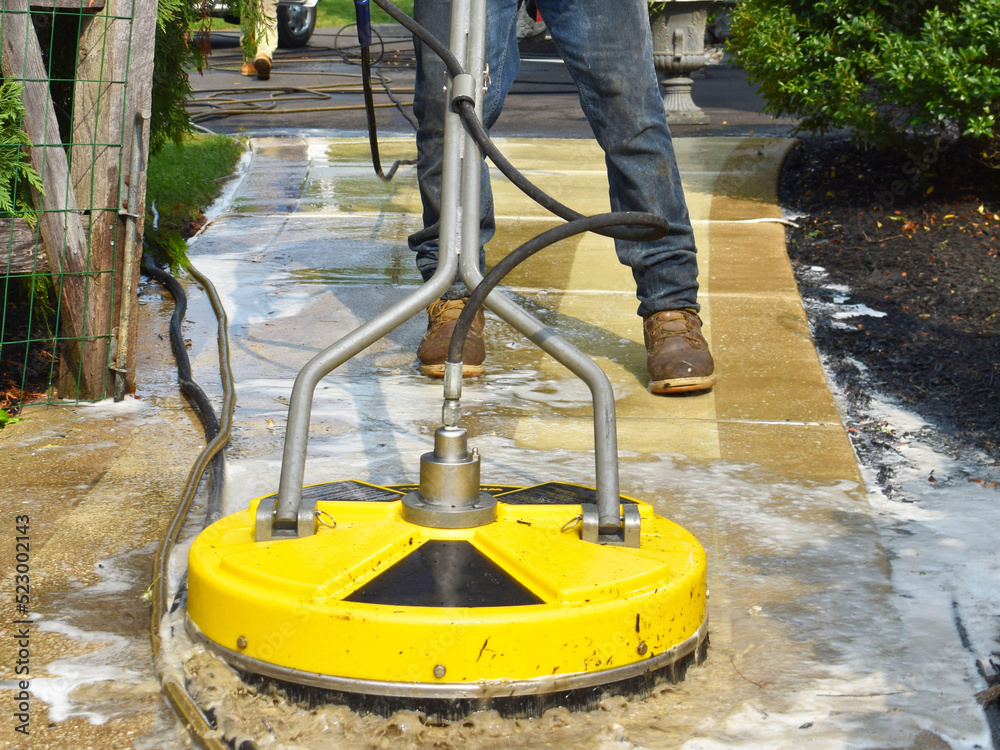 Pressure Washing on Concrete Pathway Stock Photo | Adobe Stock