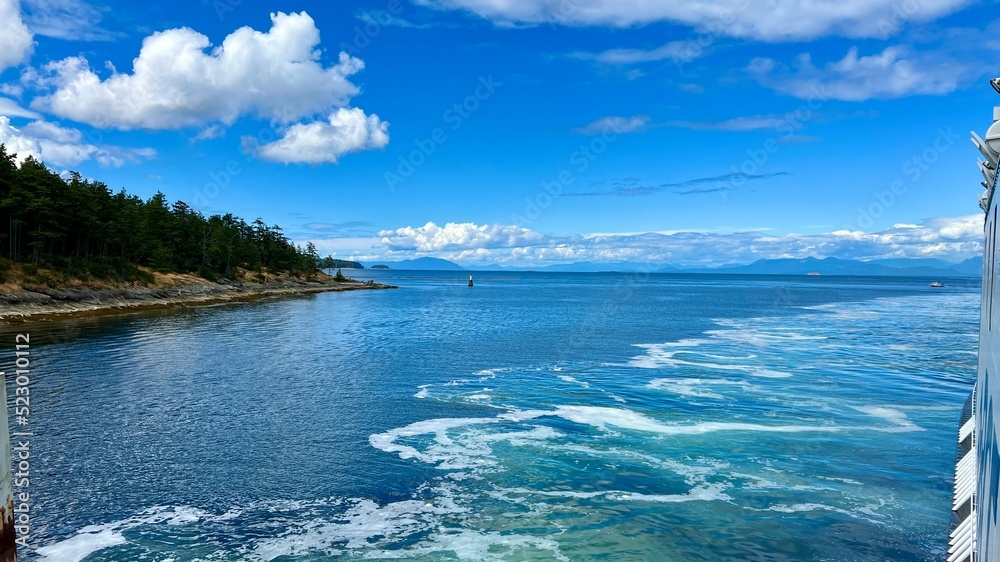 unrealistically white-gray silver Clouds on a bright blue sky a little ...