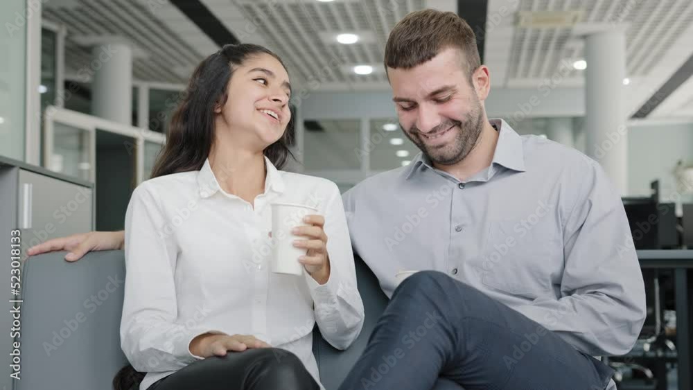 Employees sit in office at lunchtime communicate relax young woman ...