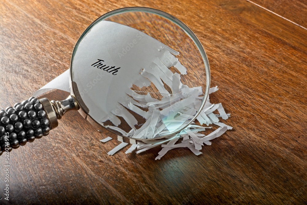 Shred of Truth concept divulging the word ‘Truth’ recovered from a pile ...