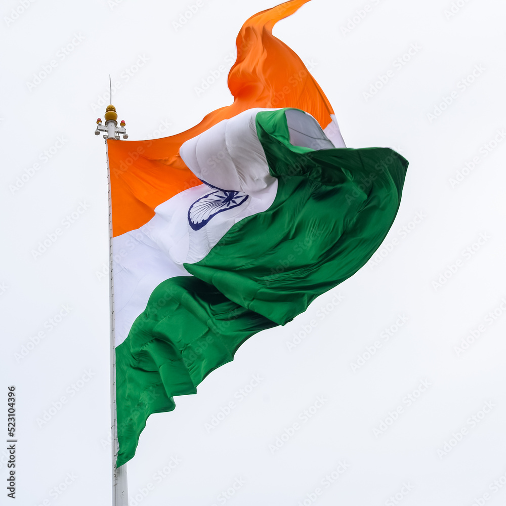 India flag flying high at Connaught Place with pride in blue sky, India ...