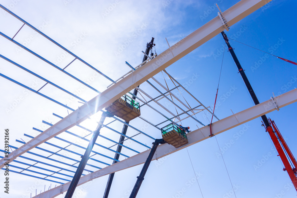 Steel structural work installation by mobile crane and boom lift ...