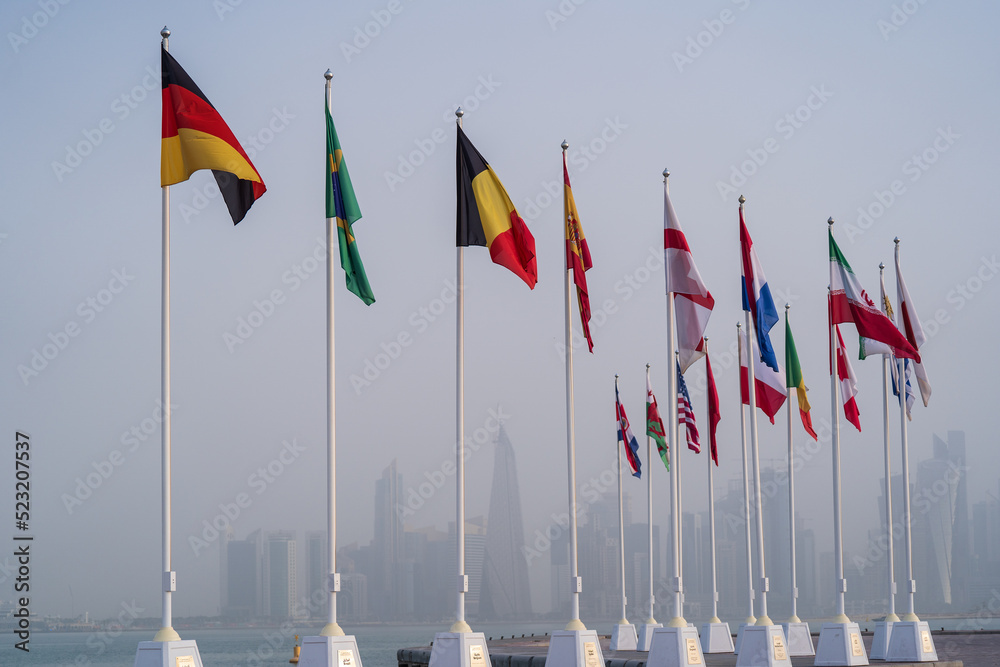 DOHA, QATAR - AUGUST 12, 2022: Flags of the qualified countries for the ...