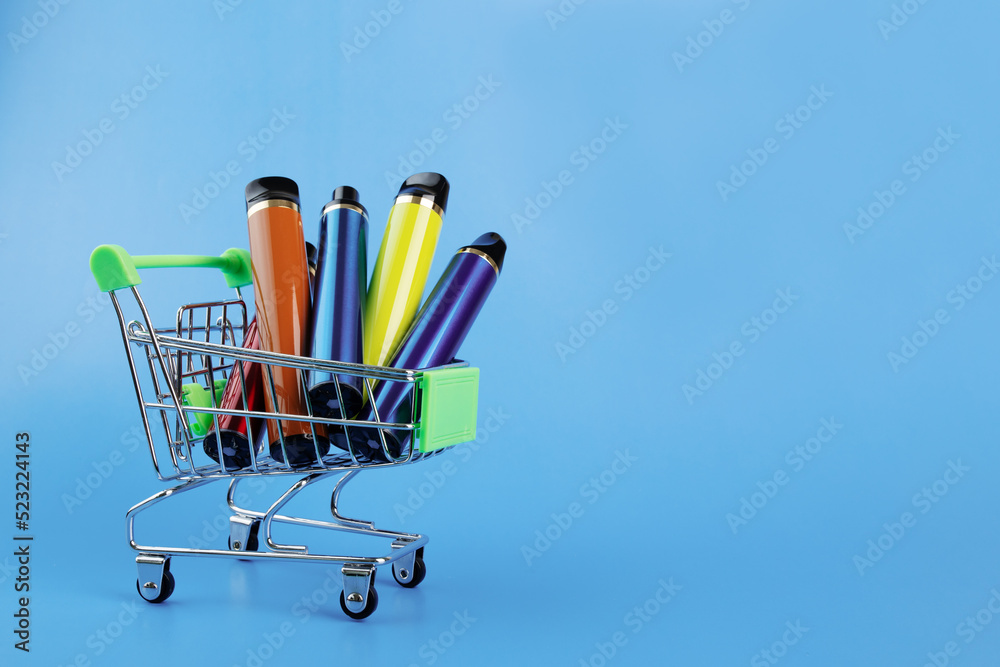 disposable vape in a trolley, electronic cigarettes in a shopping cart ...