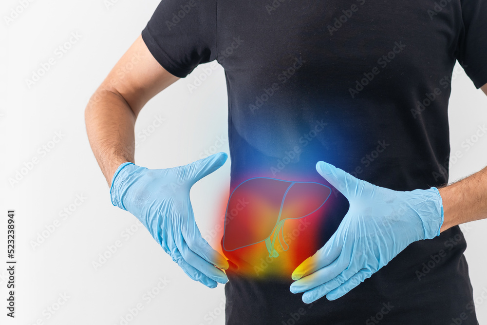 The photo of large intestine is on the man's body against gray ...