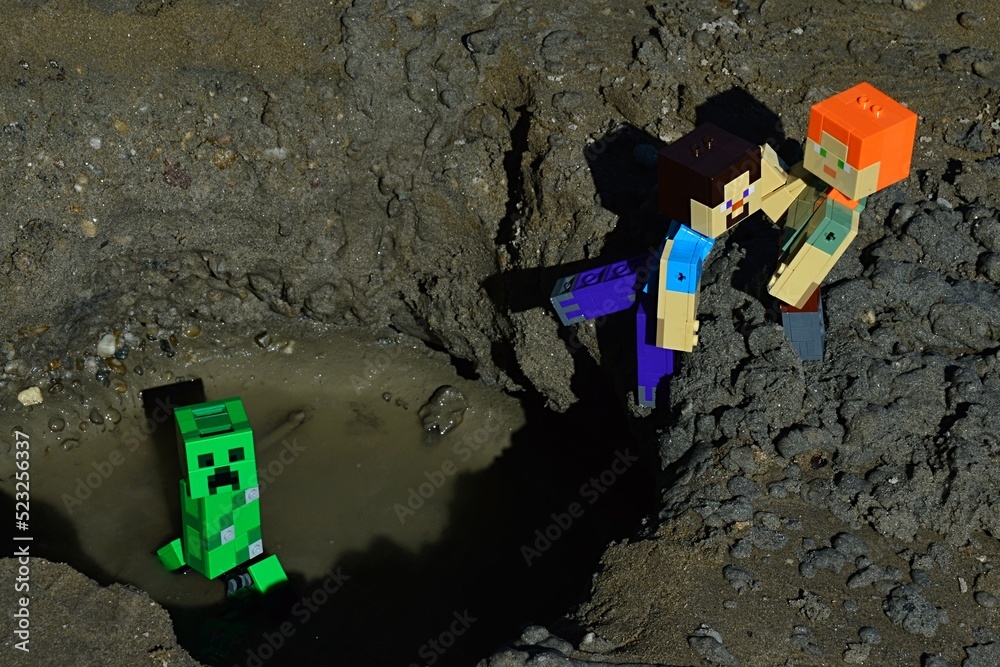 LEGO Minecraft large figure of Alex is rescuing Steve from large muddy ...