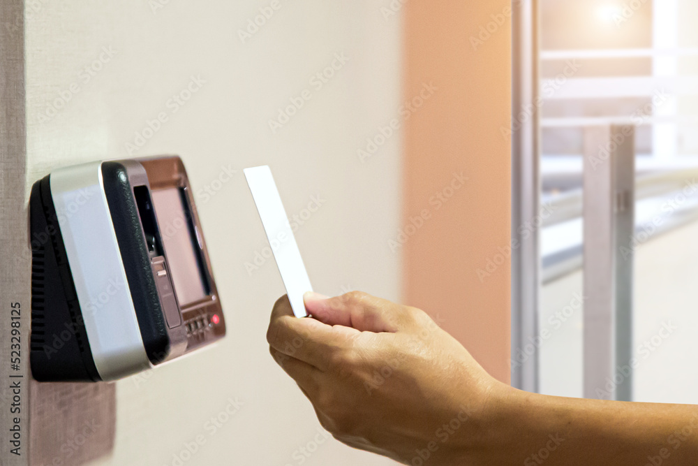 Proximity card reader door unlock, Hand security man using ID card on fingerprint scanning ...