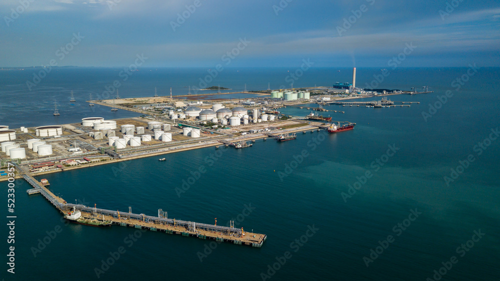 Aerial view oil terminal and coal power plant station in sea, White oil ...