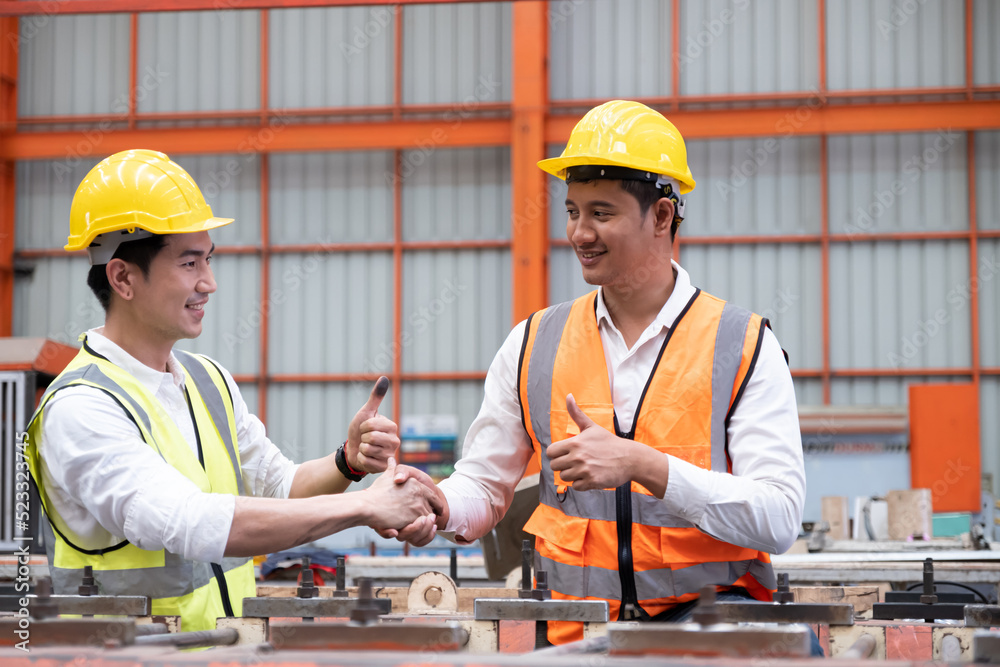 Selective focus at Asian men mechanical engineer, wearing safety ...
