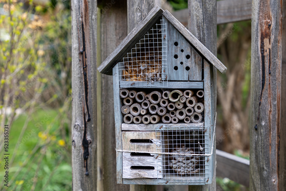 Wooden bug hotel. Different areas for different types of insects ...