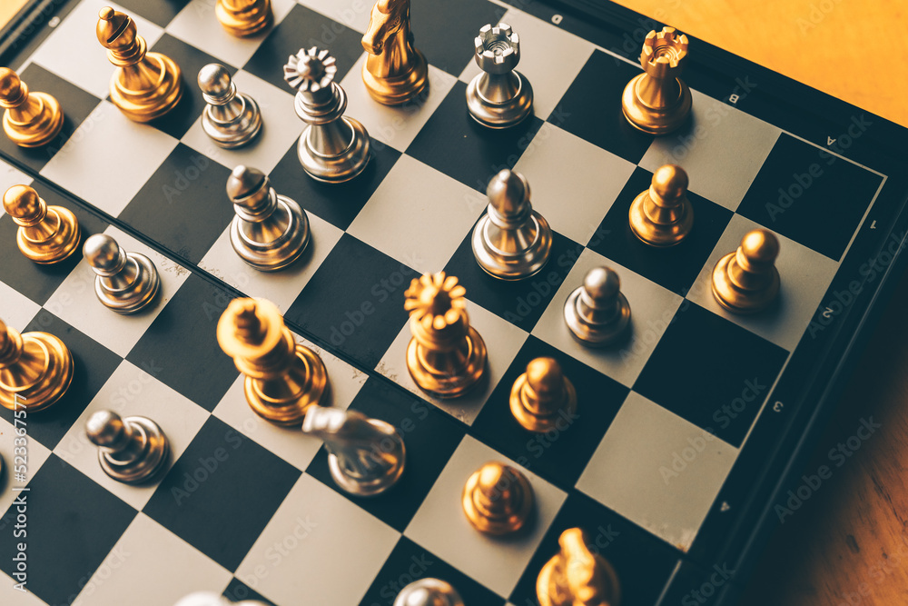 Chess board game to represent the business strategy with competition in ...