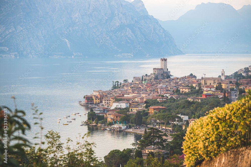 Idyllic coastline in Italy: Blue water and a cute village at lago di ...