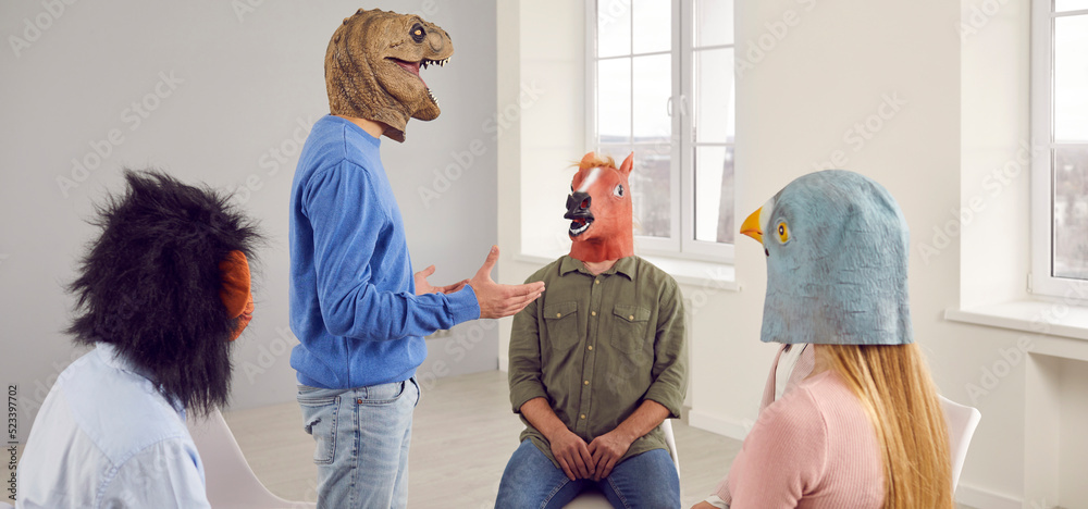 Team of people with animal faces having an interesting discussion ...