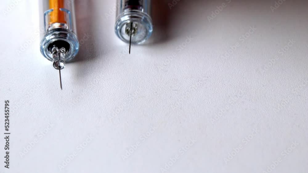 Multiple injection syringes show vaccinations doses and booster ...