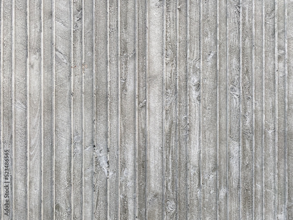 Close-up of a precast tilt slap concrete wall background with wood ...