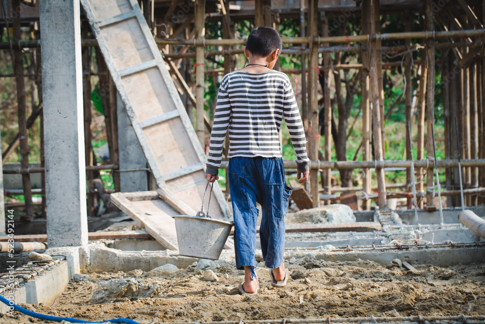 Poor children working at construction site against children labour ...
