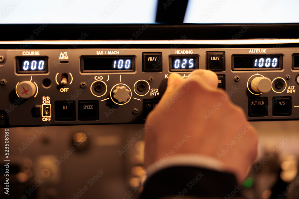 Stockfoto Pilot aviator fixing altitude and longitude level on ...