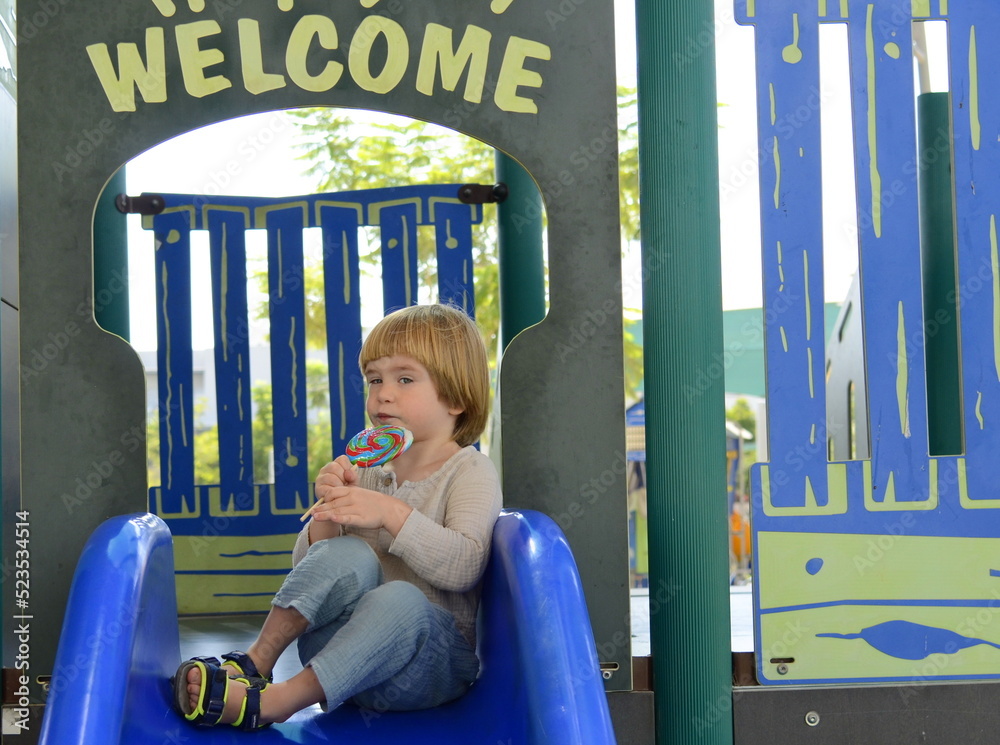 Concept: welcome to kindergarten, preschool education. Little cute boy ...