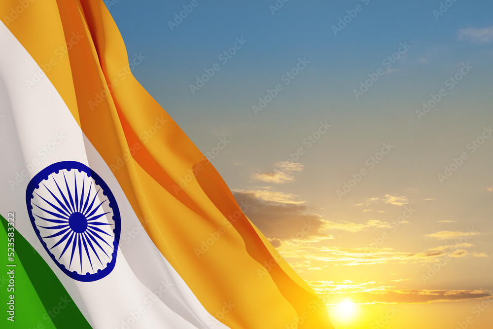 Waving India flag on sunset sky. Background with place for your text ...