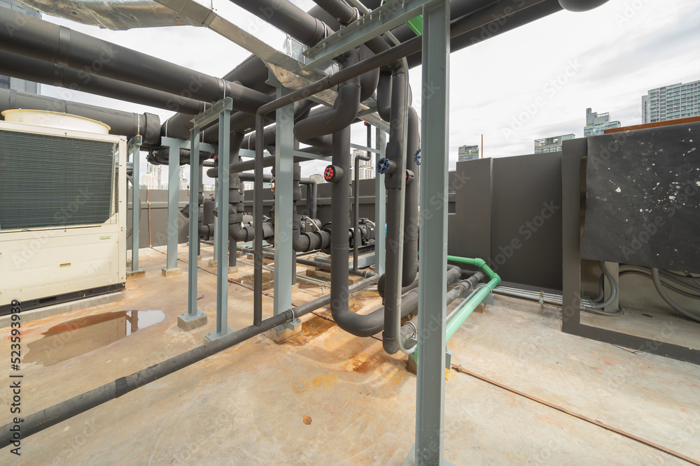 Chiller tower or cooling tower on rooftop of a office building in urban ...