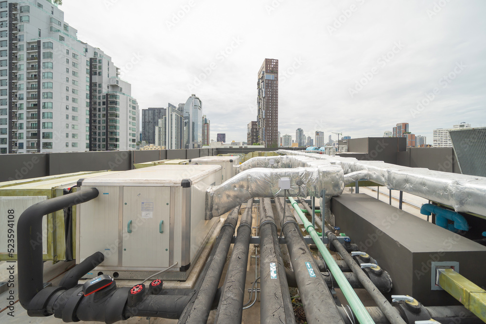 Chiller tower or cooling tower on rooftop of a office building in urban ...